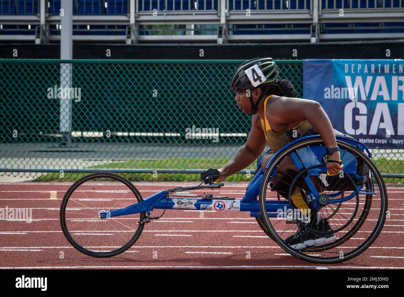 U.S. Army Corine Hamilton cycles through the track competition during ...