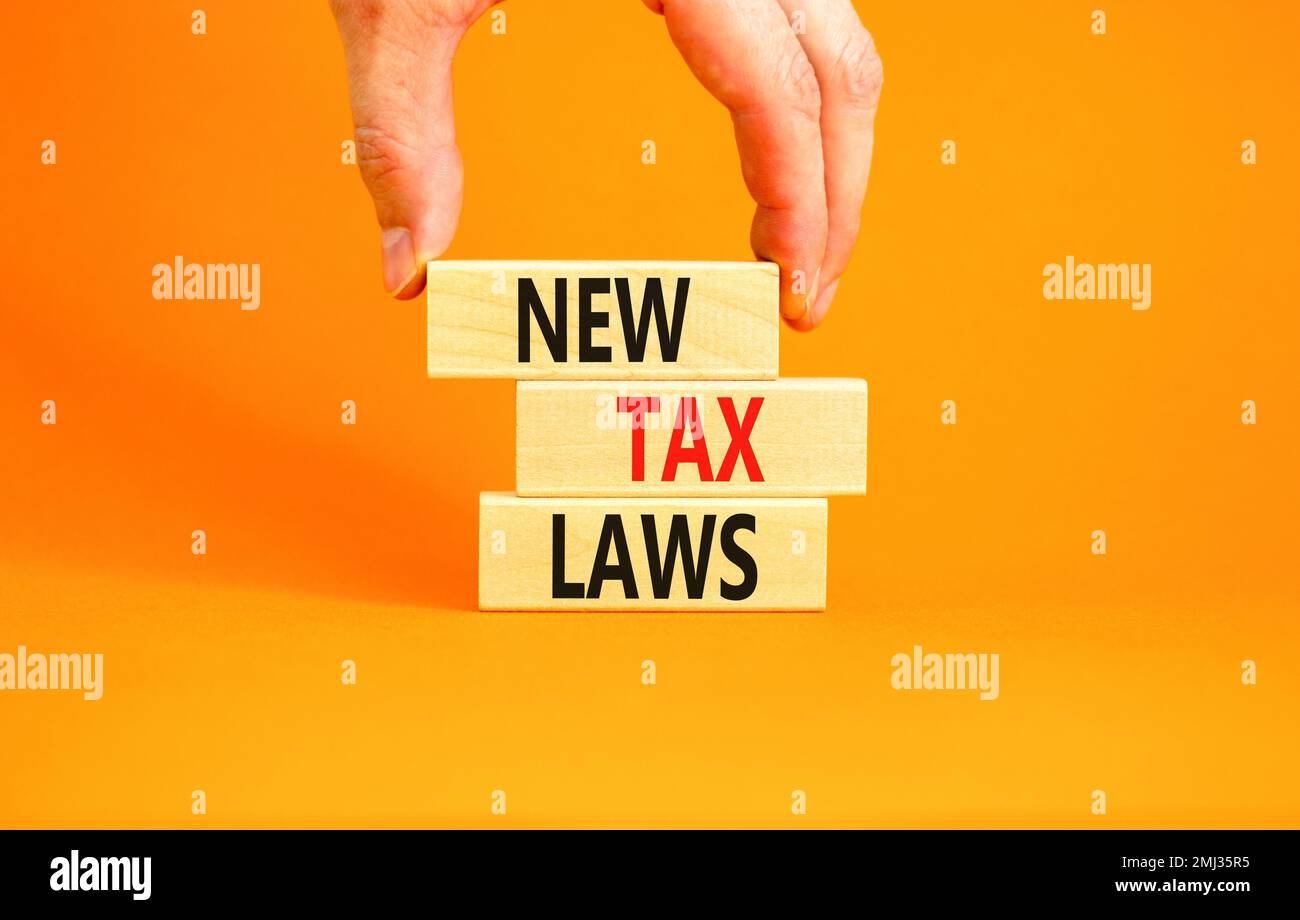 New tax laws symbol. Concept words New tax laws on wooden blocks on a ...