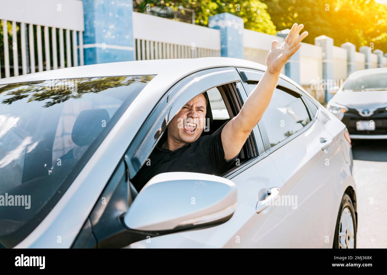 Angry driver yelling at another driver. Driver man yelling at driver ...