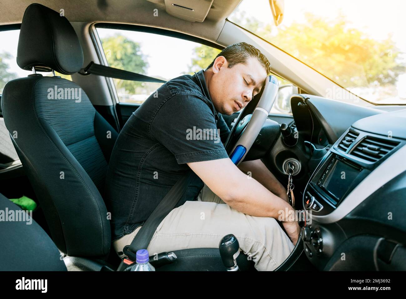 View Of A Driver Asleep At The Wheel Tired Driver With Closed Eyes At