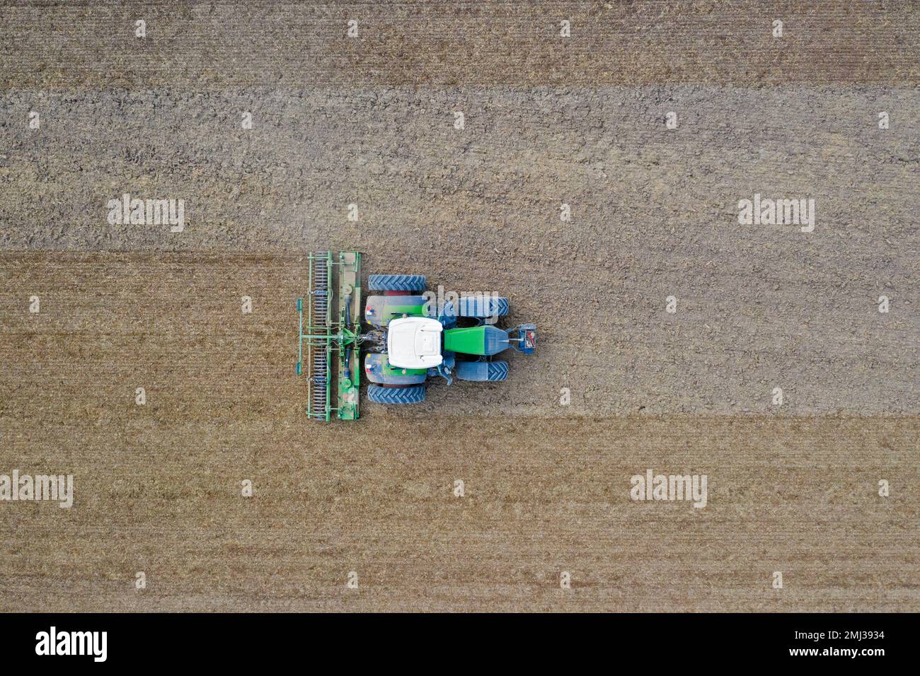 Tractor with rotary harrow, agricultural machine for seedbed ...