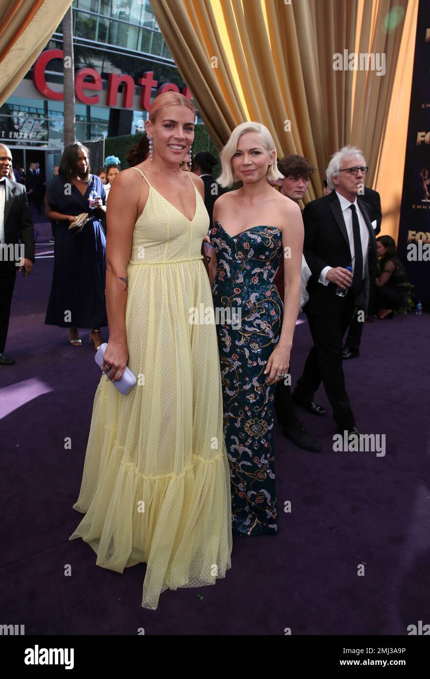 Busy Philipps, left, and Michelle Williams arrive at the 71st Primetime ...