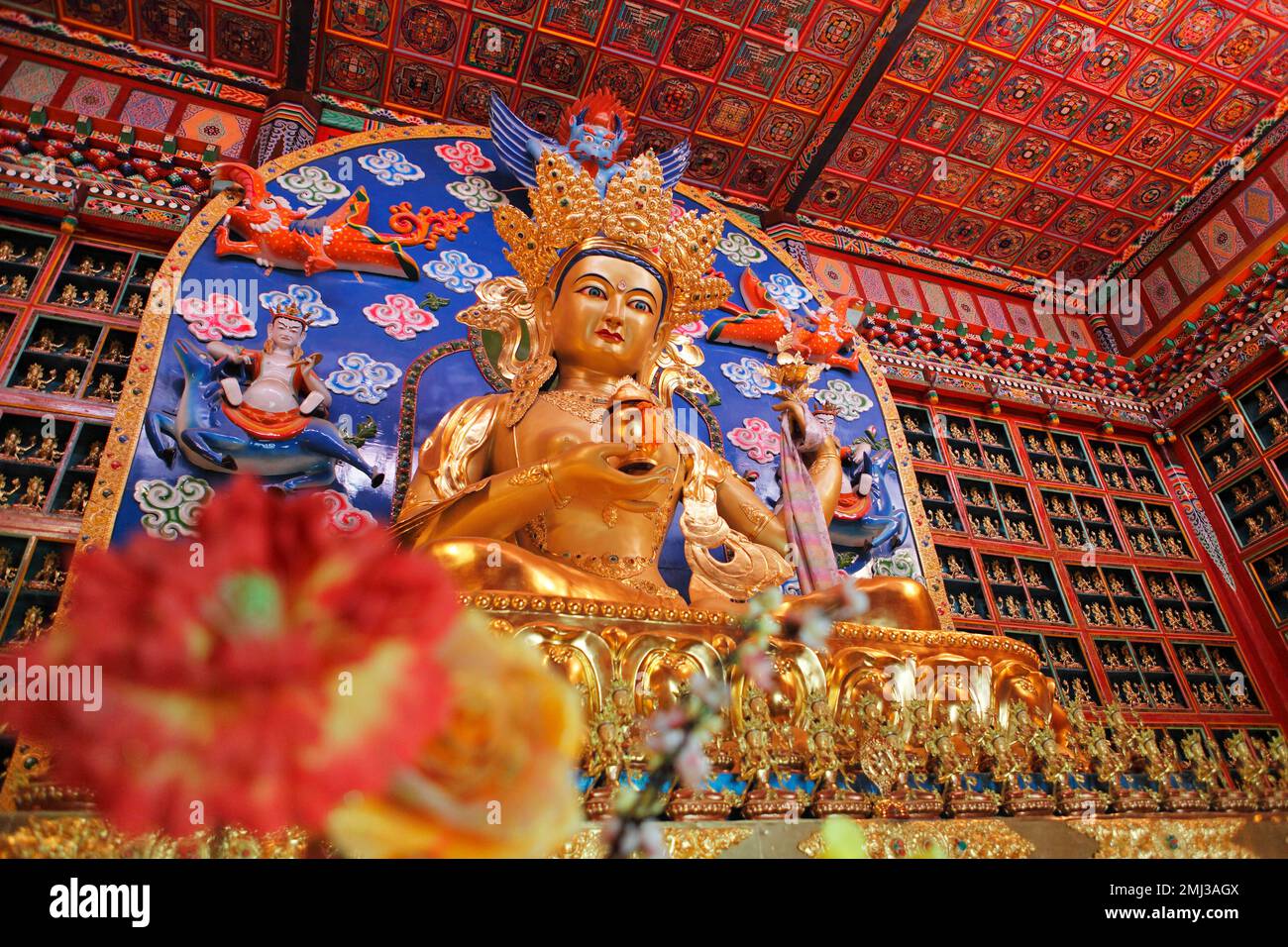 Golden Buddha statue at Tseway Monastery, Ganjia, Gansu Province, China ...