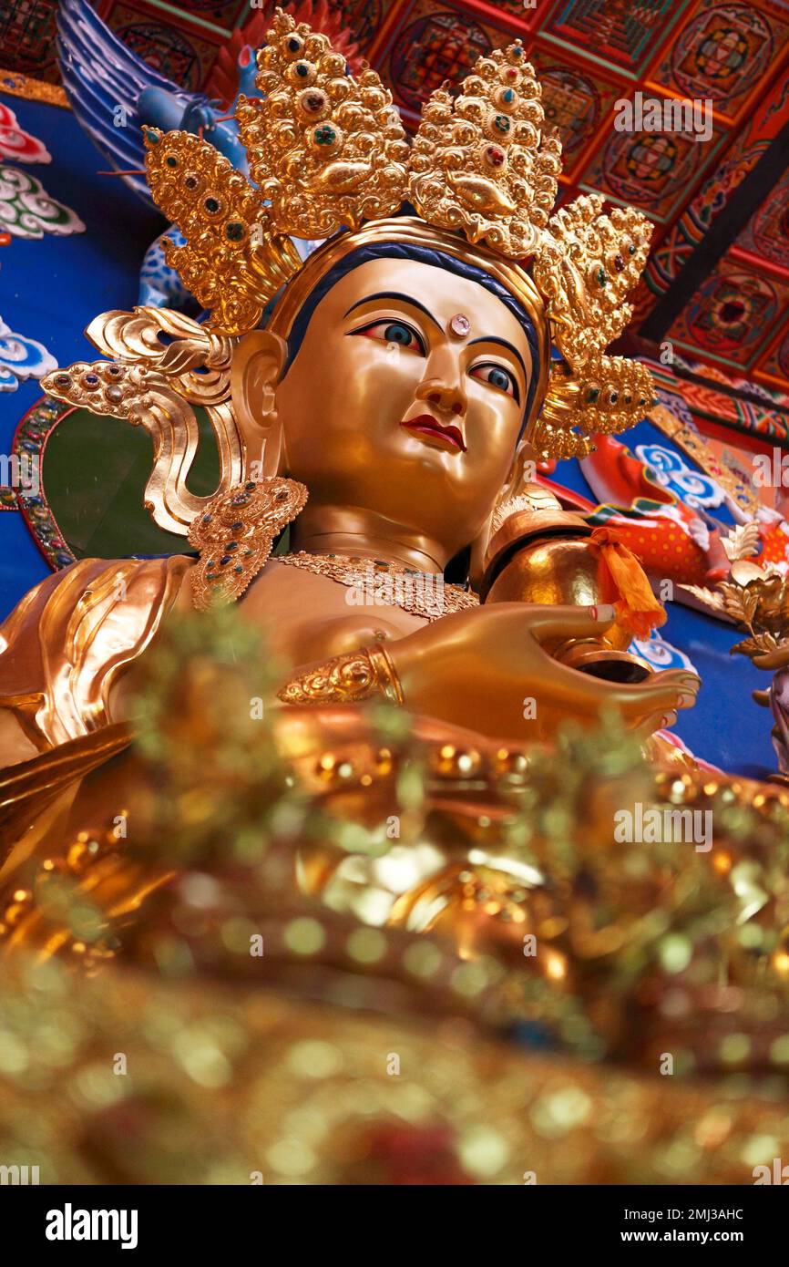 Golden Buddha statue at Tseway Monastery, Ganjia, Gansu Province, China ...