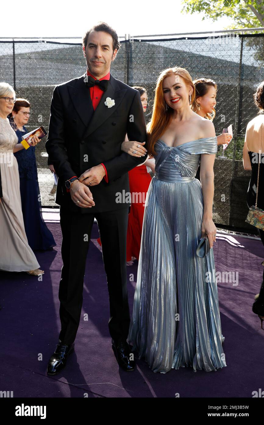 Sacha Baron Cohen, left, and Isla Fisher arrive at the 71st Primetime ...