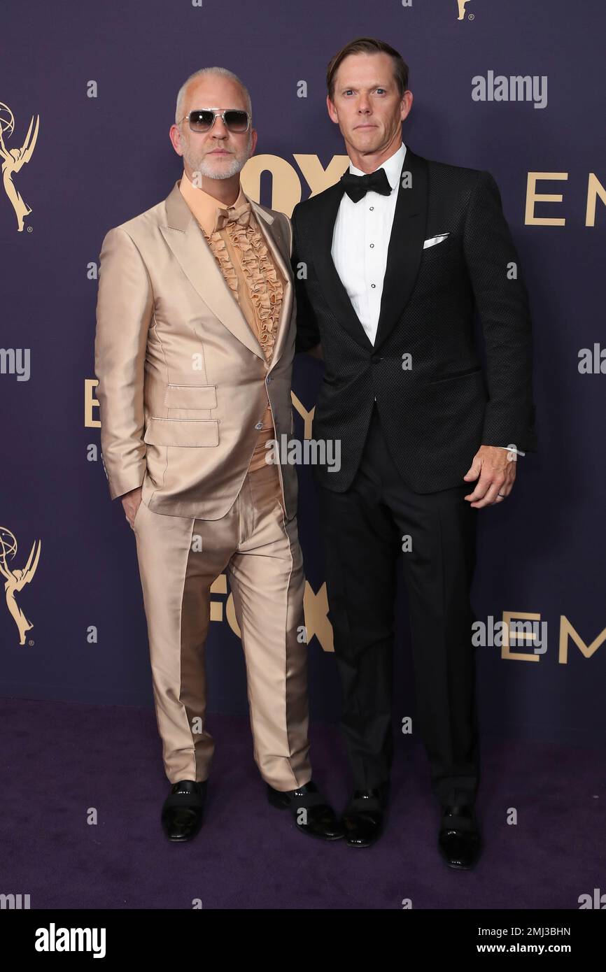 Ryan Murphy, left, and David Miller arrive at the 71st Primetime Emmy ...