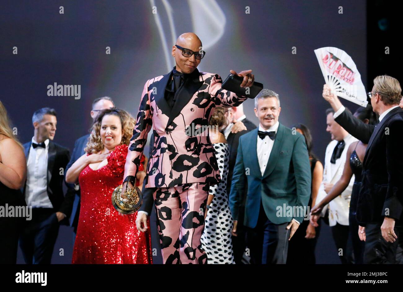 RuPaul, center, and the cast and crew of "RuPaul's Drag Race" accept ...