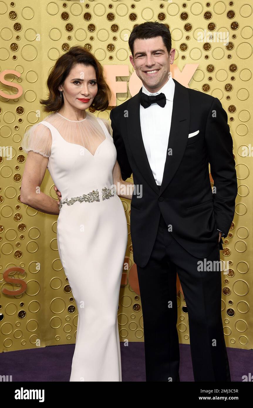 Tess Sanchez, left, and Max Greenfield arrive at the 71st Primetime ...