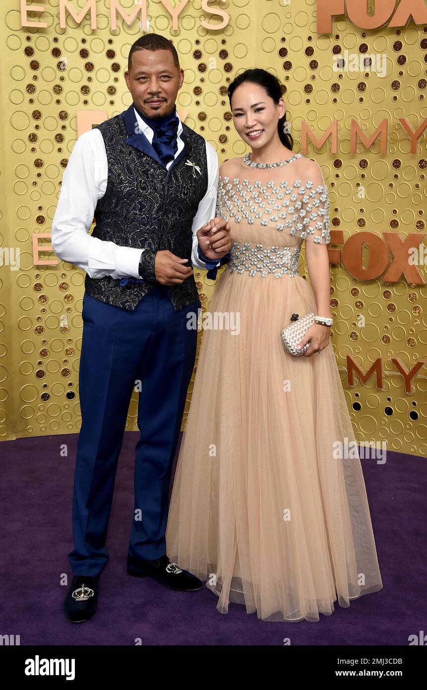 Terrence Howard, left, and Mira Pak arrive at the 71st Primetime Emmy ...