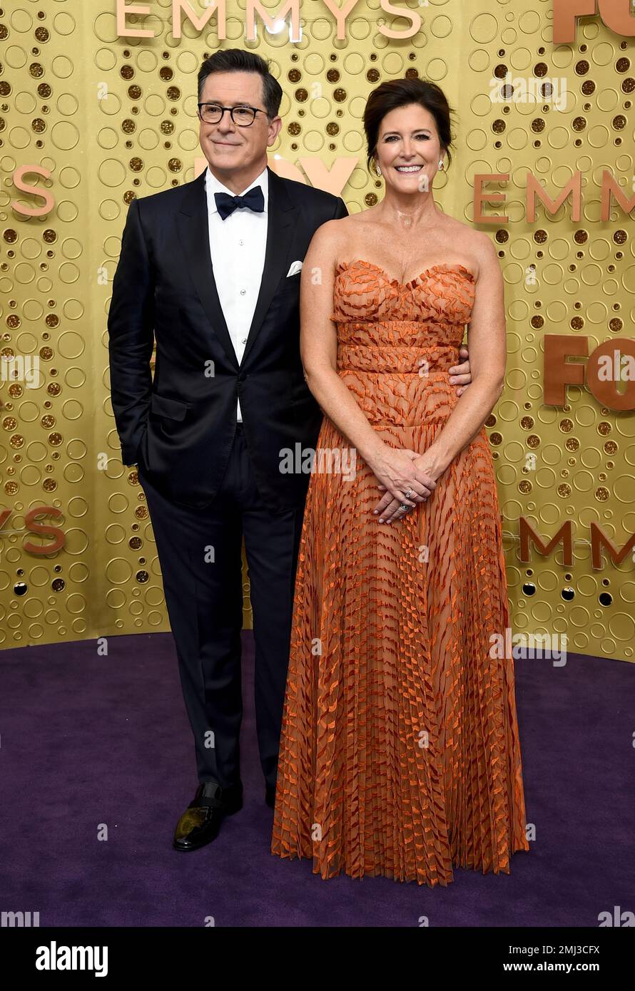 Stephen Colbert, left, and Evelyn McGee-Colbert arrive at the 71st ...