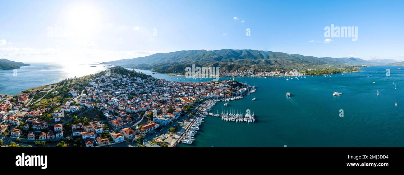Town view, aerial view, Poros island with town and Peloponnesian coast ...