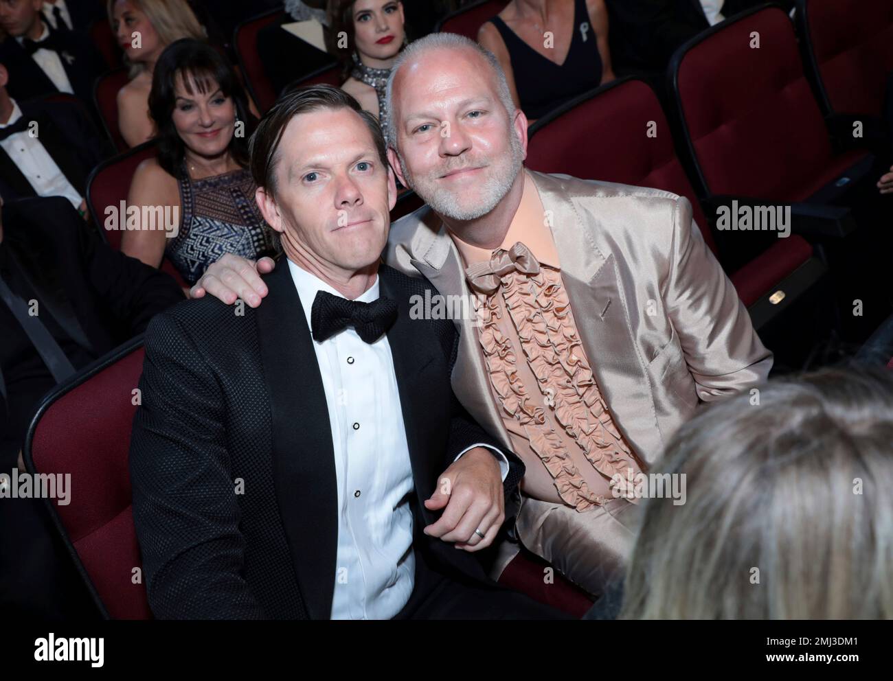 EXCLUSIVE - David Miller, left, and Ryan Murphy pose in the audience at ...