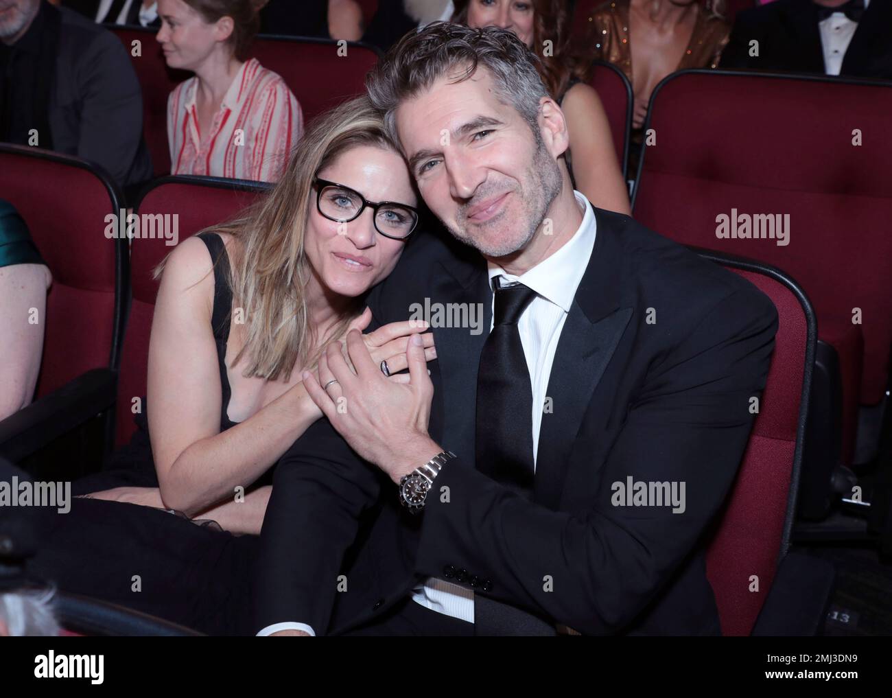 EXCLUSIVE - Amanda Peet, left, and David Benioff pose in the audience ...