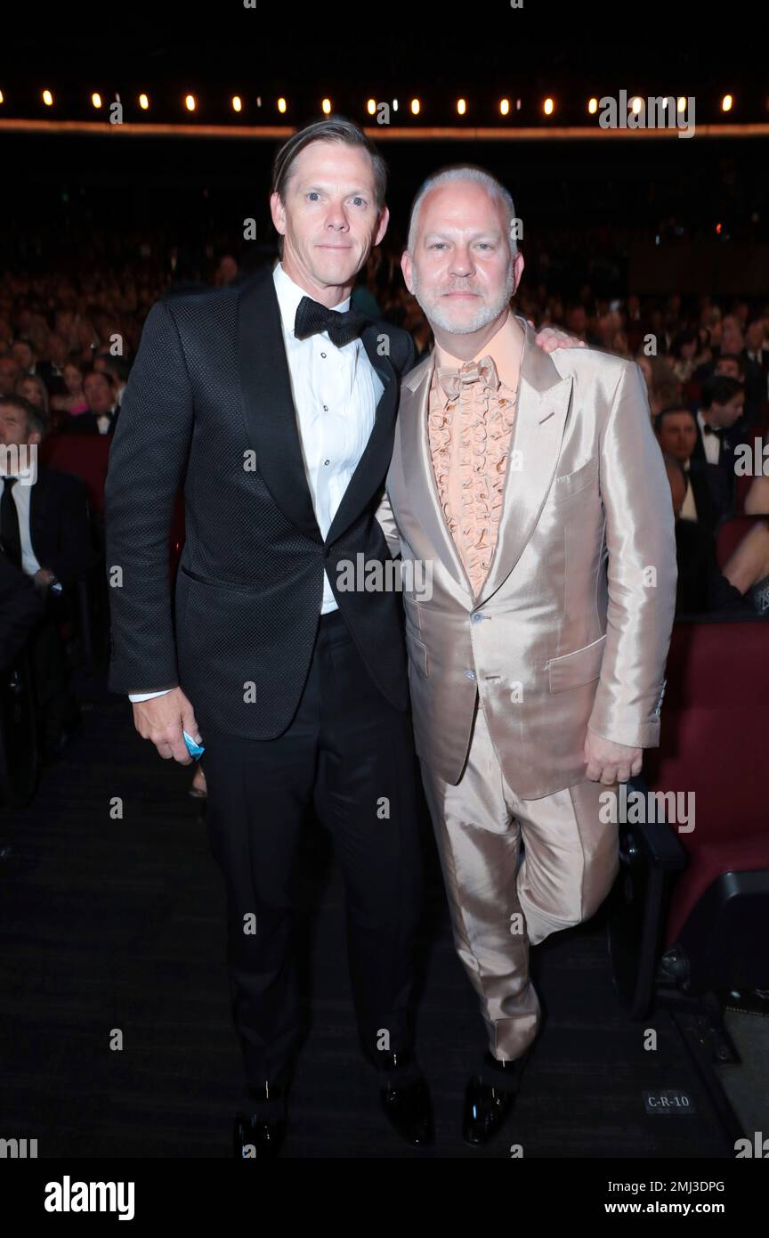 EXCLUSIVE - David Miller, left, and Ryan Murphy pose in the audience at ...