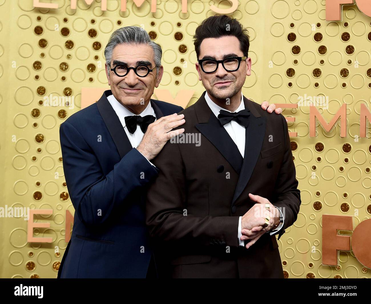 Eugene Levy, left, and Dan Levy arrive at the 71st Primetime Emmy ...