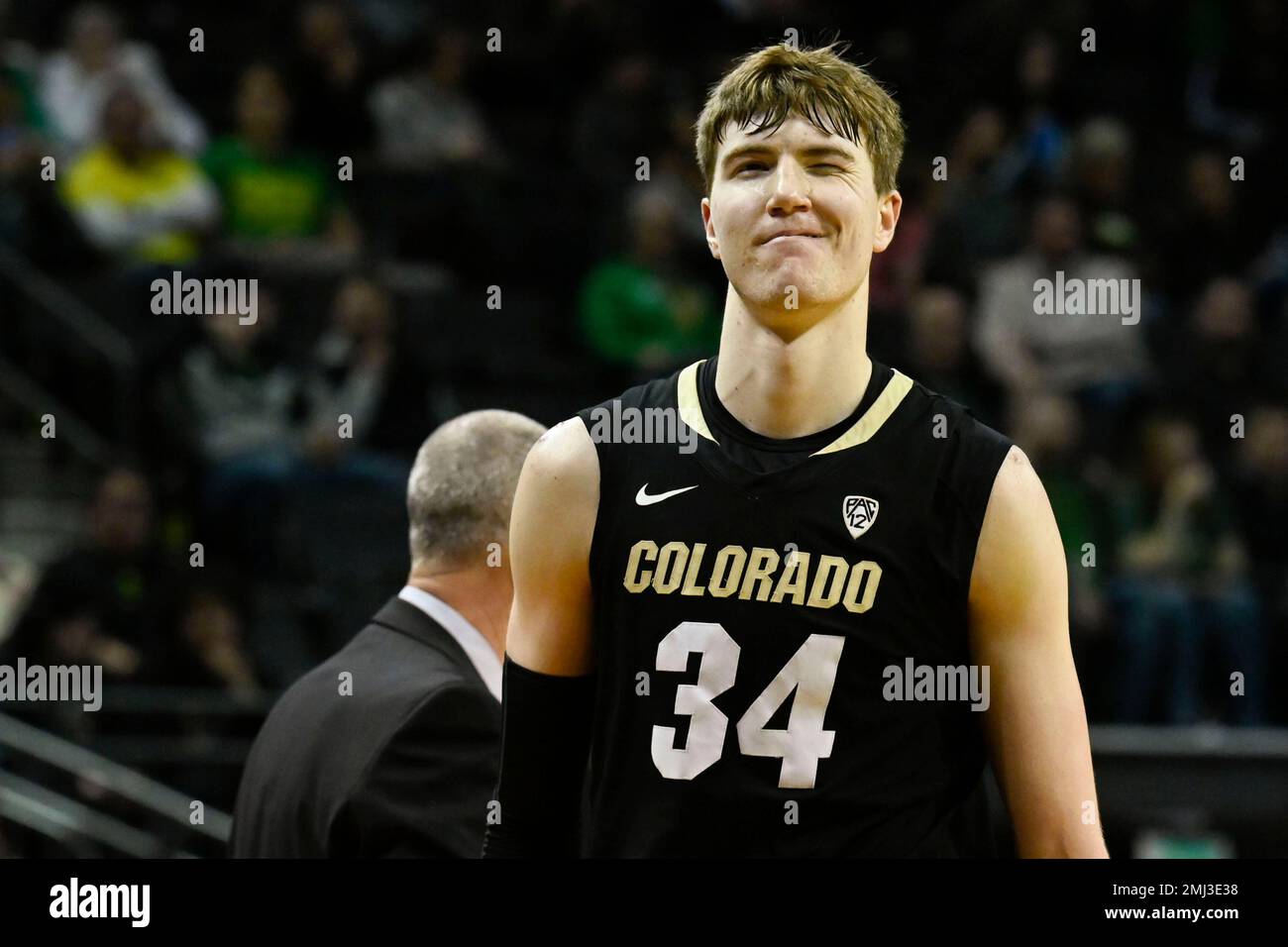 Colorado center Lawson Lovering (34) winks at Oregon fans as he heads ...