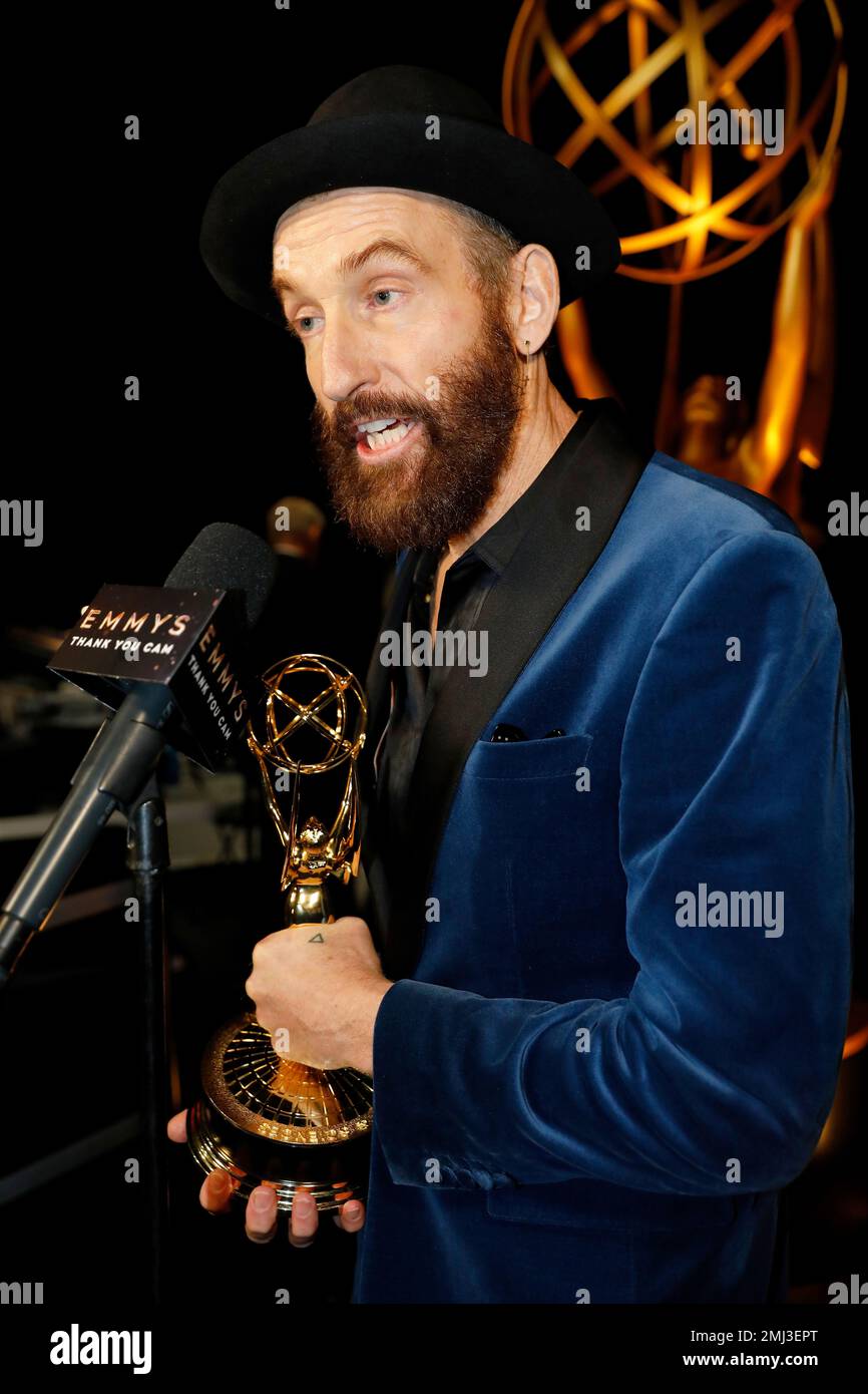 Johan Renck poses with the award for outstanding directing for a ...