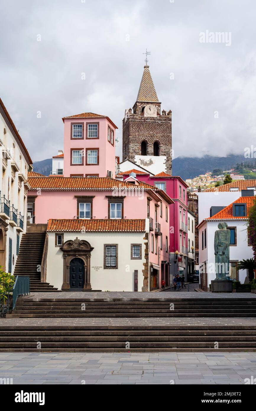 Small square in the old town with colourful houses and chapel Capela de ...