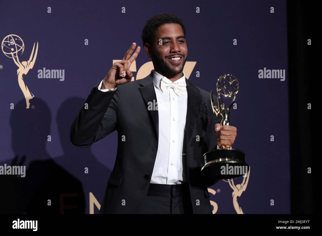 Jharrel Jerome poses in the press room with his award for outstanding ...