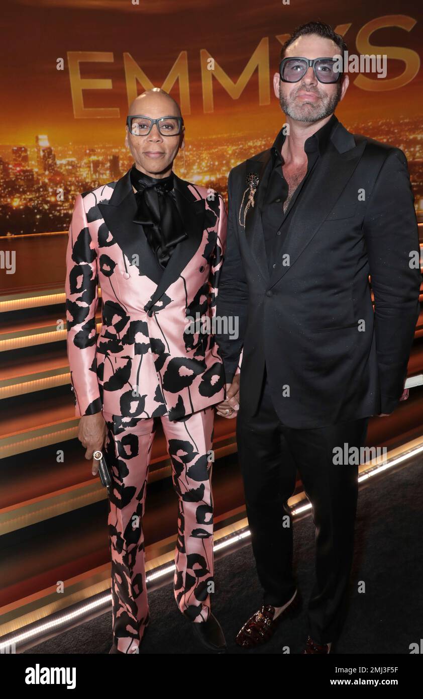 EXCLUSIVE - RuPaul, left, and Georges LeBar pose in the audience at the ...