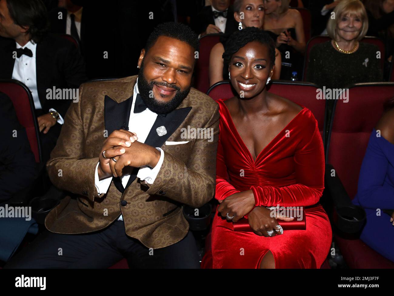 Anthony Anderson, left, and Alvina Stewart pose in the audience at the ...