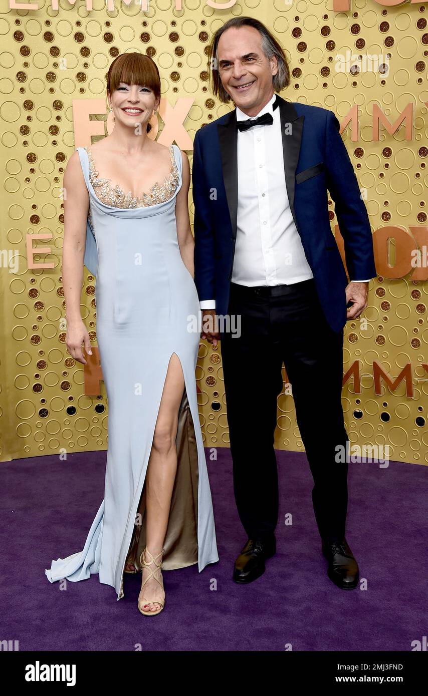 Emmanuelle Vaugier, left, and Vince Calandra arrive at the 71st ...