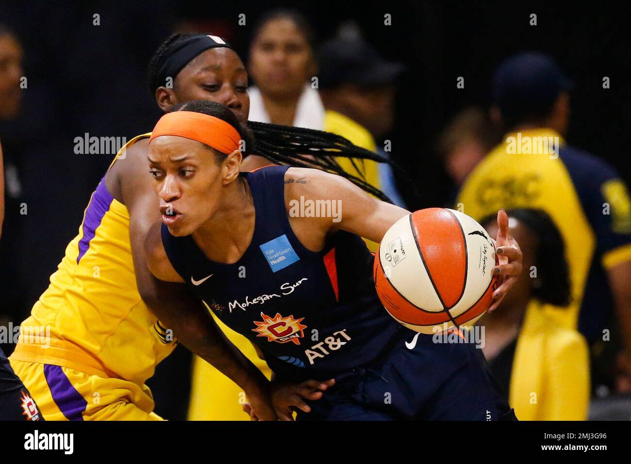 Connecticut Sun's Jasmine Thomas (5) drives during the second half of ...