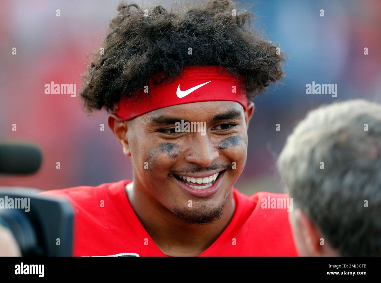 New Mexico quarterback Tevaka Tuioti speaks with a broadcaster at the ...