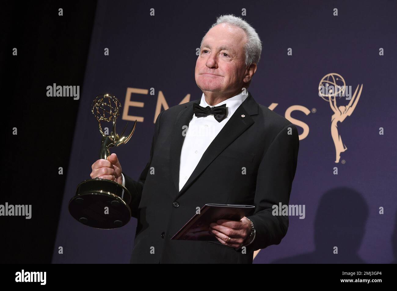 Lorne Michaels poses in the press room with the award for outstanding ...