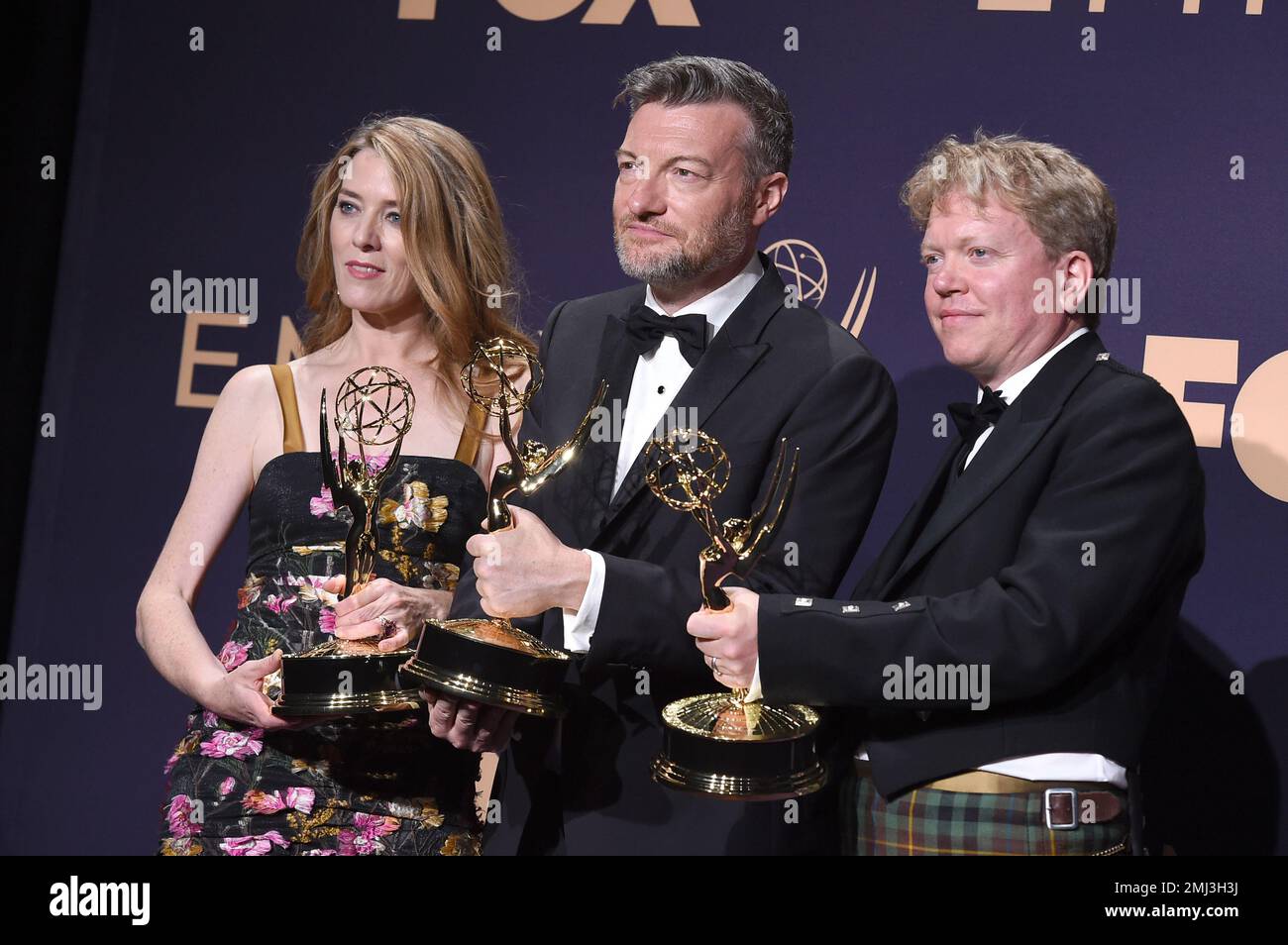 Annabel Jones, from left, Charlie Brooker and Russell McLean poses in ...