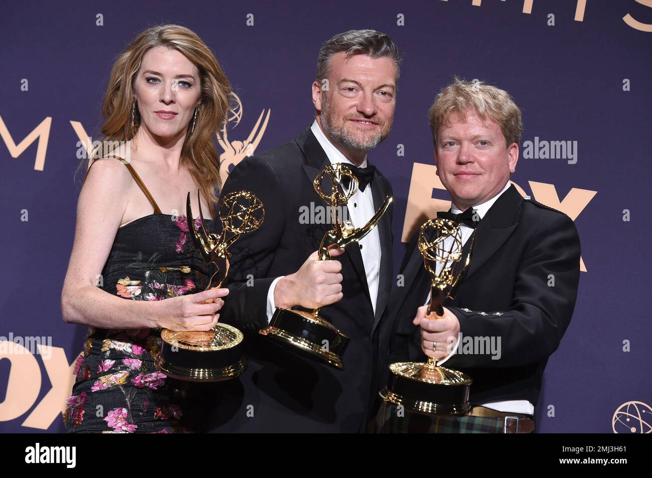 Annabel Jones, from left, Charlie Brooker and Russell McLean poses in ...