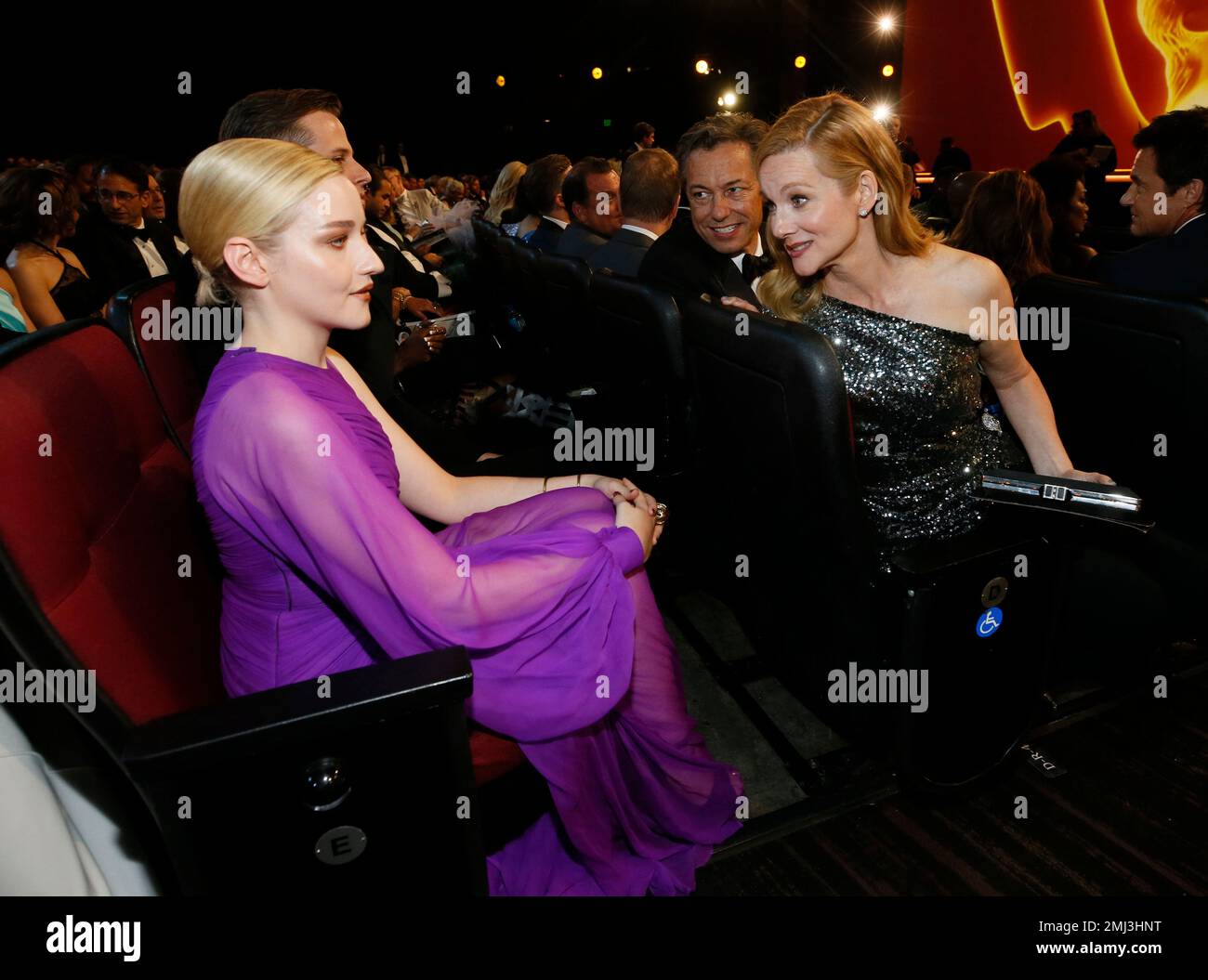 Julia Garner, from left, Laura Linney, and Marc Schauer in the audience ...