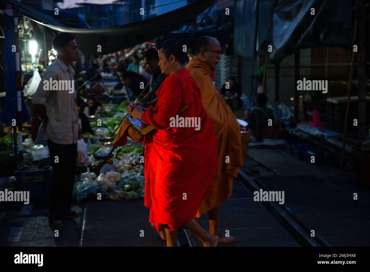 Monks Walking Through the Rom Hup Market at Night - Thailand Stock ...