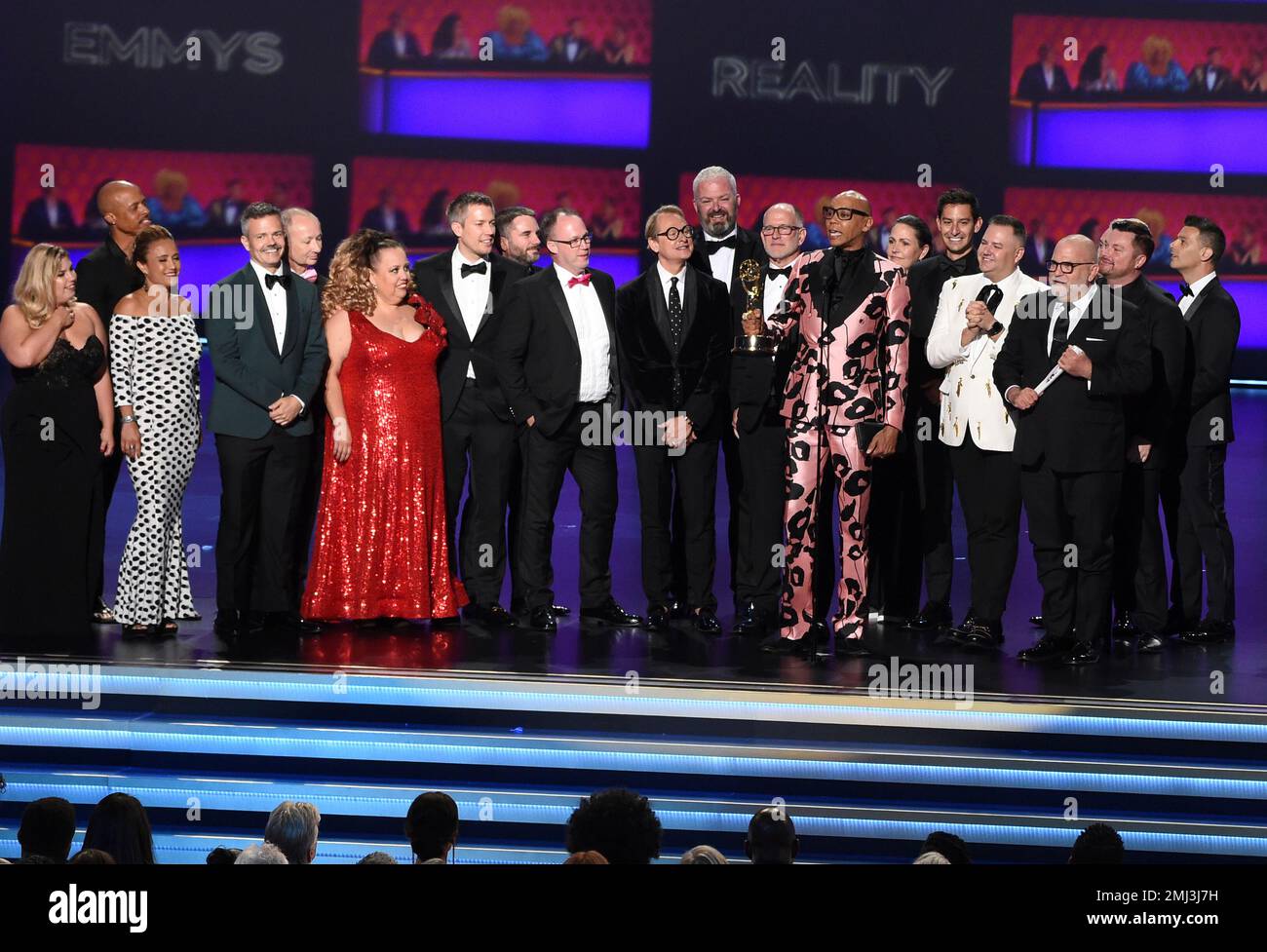 RuPaul and the cast and crew of "RuPaul's Drag Race" accept the award ...