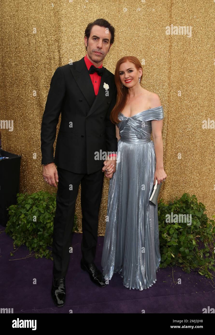 Sacha Baron Cohen, left, and Isla Fisher arrive at the 71st Primetime ...