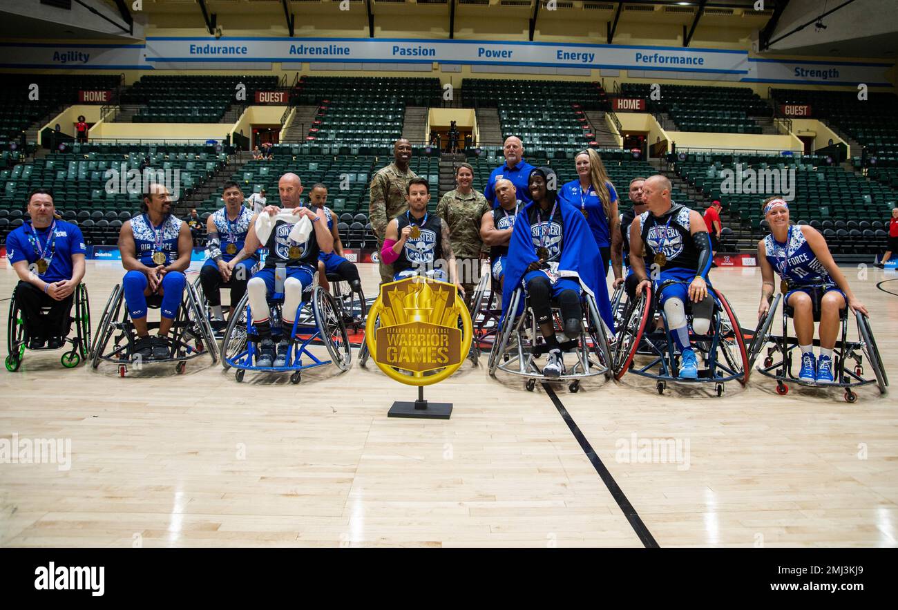 Team Air Force wheelchair basketball athletes pose for a photo with Maj ...