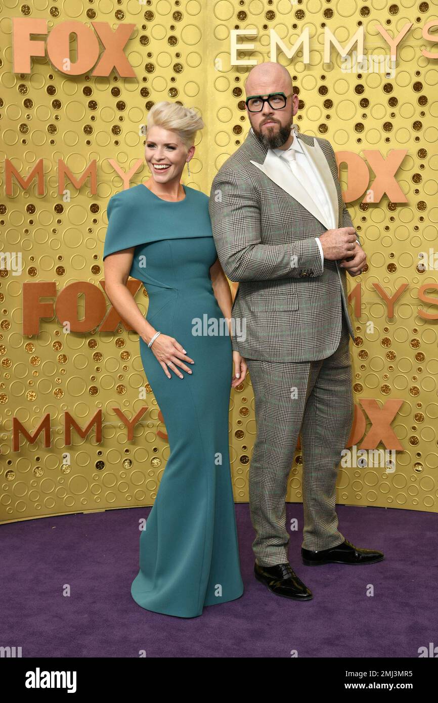 Rachel Reichard, left, and Chris Sullivan arrive at the 71st Primetime ...