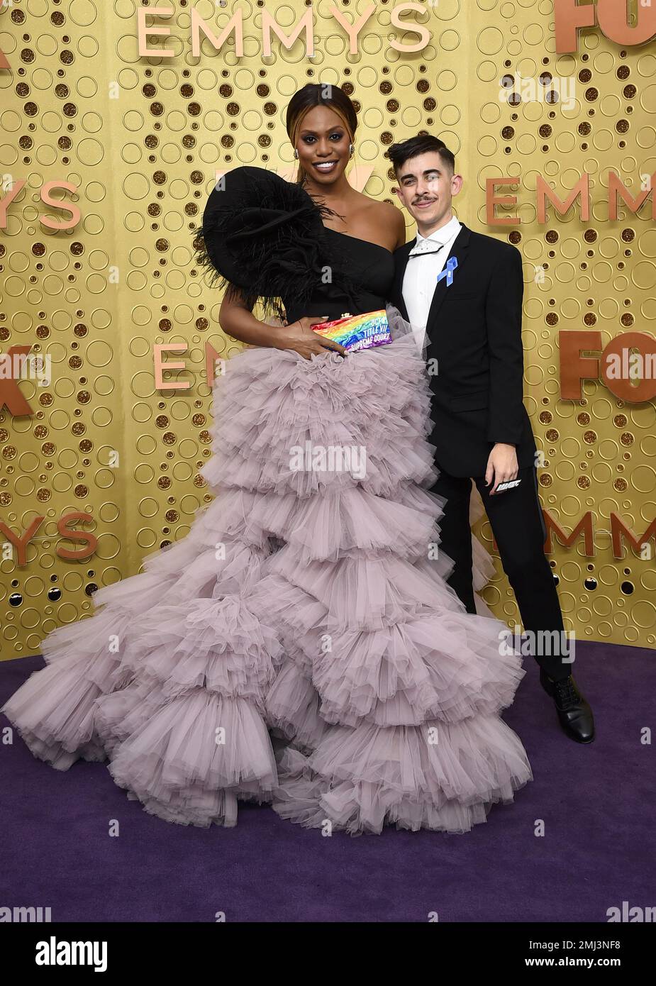 Laverne Cox, left, and Jono Freedrix arrive at the 71st Primetime Emmy ...