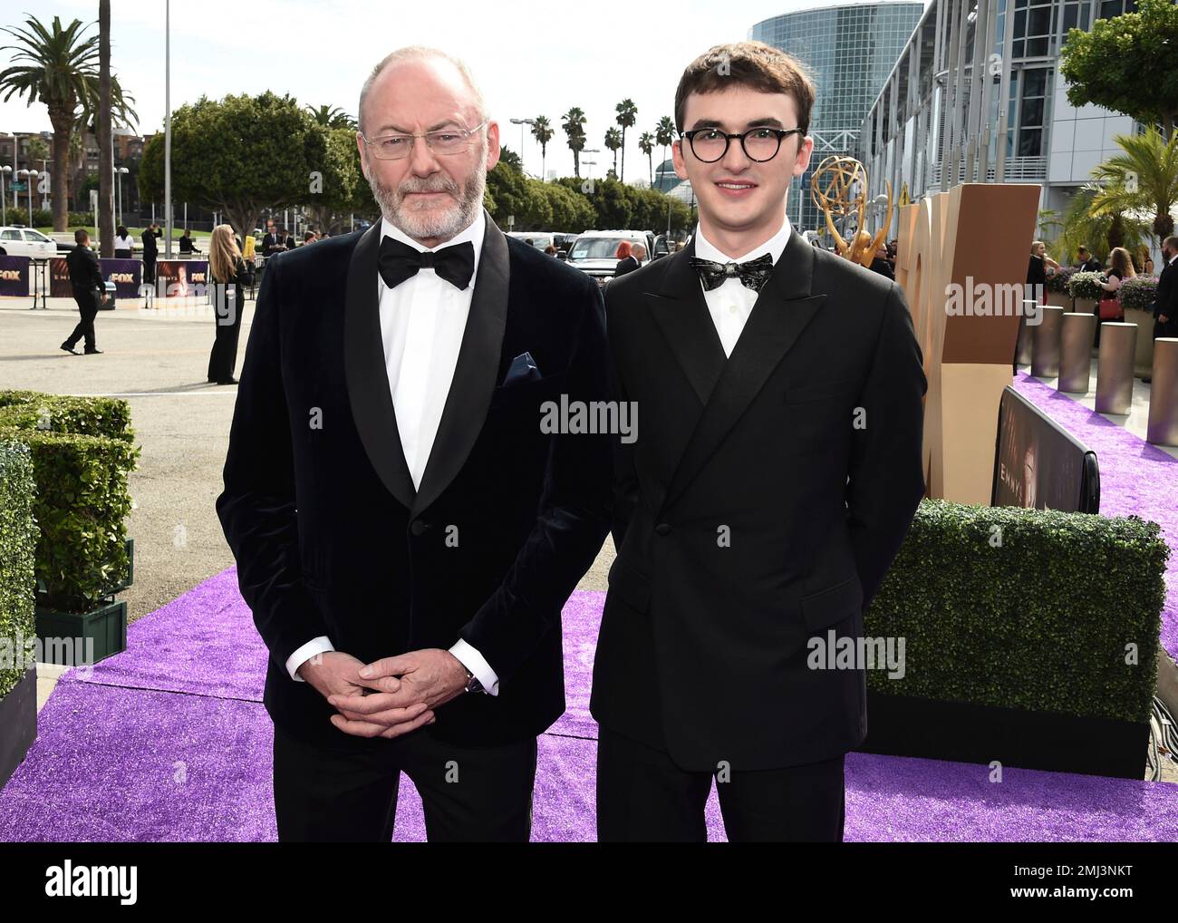 EXCLUSIVE - Liam Cunningham, left, and Isaac Hempstead Wright arrive at ...