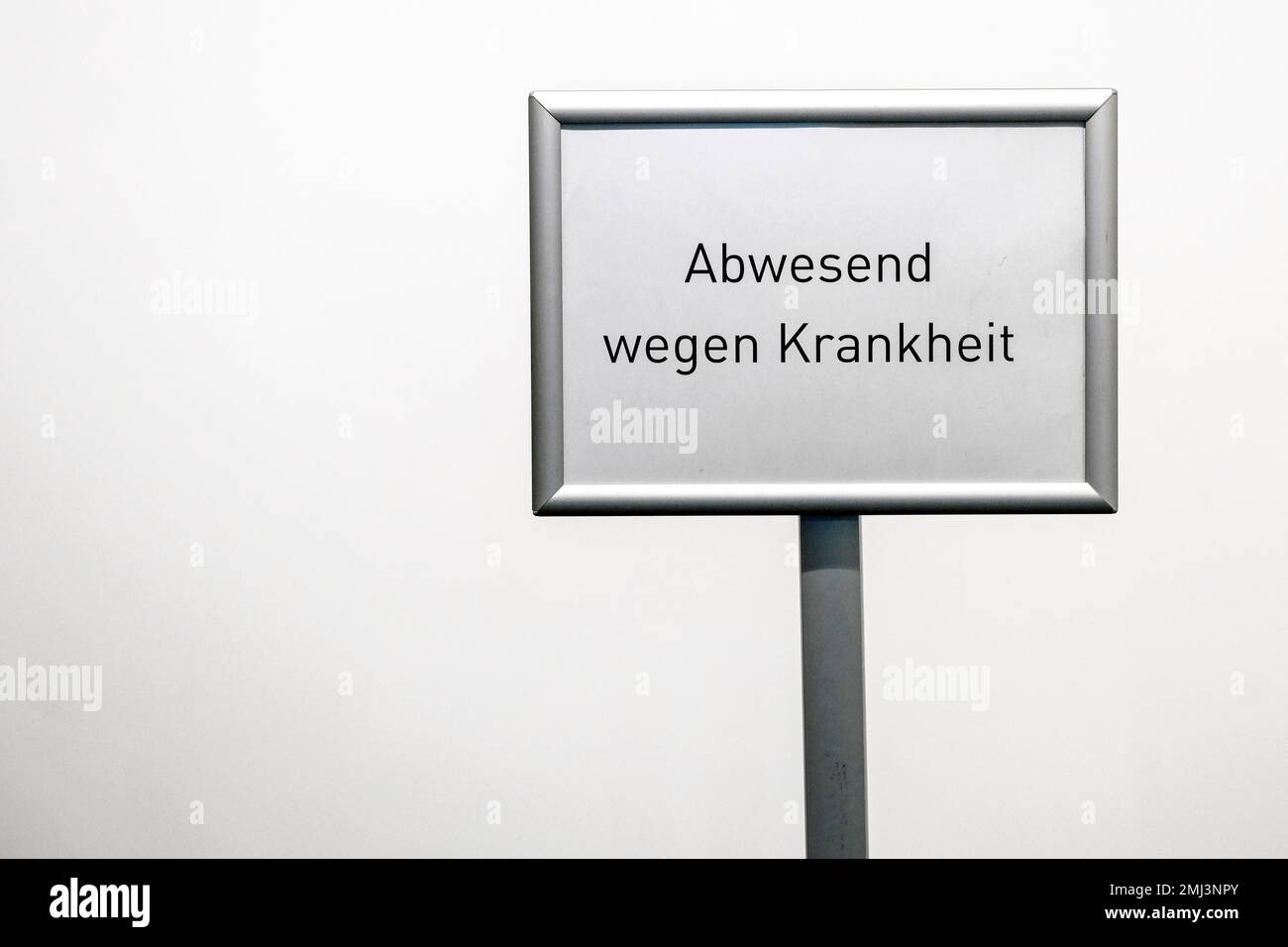 Sign Absent due to illness Stock Photo - Alamy