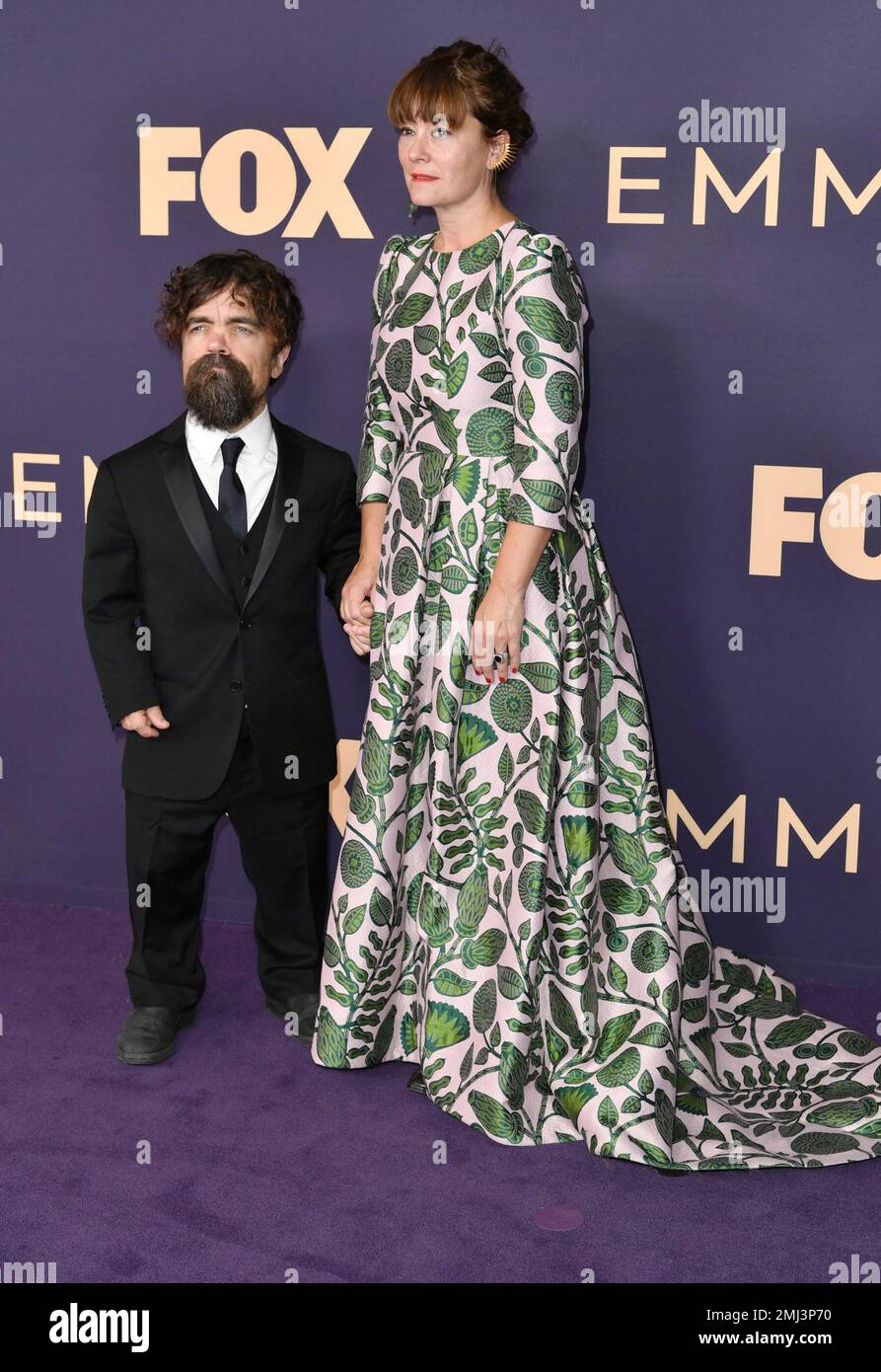 Peter Dinklage, left, and Erica Schmidt arrive at the 71st Primetime ...