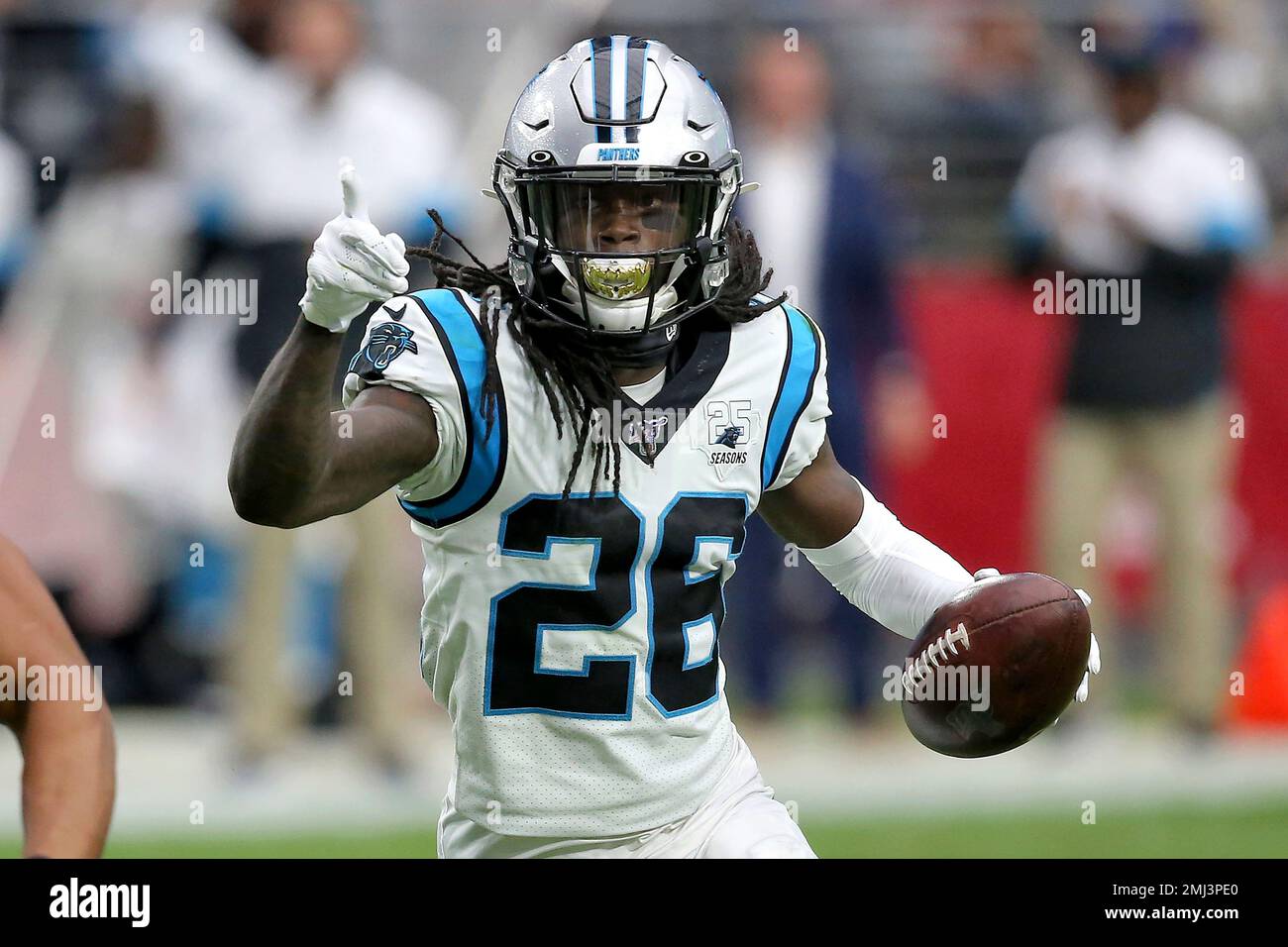 Carolina Panthers cornerback Donte Jackson (26) runs after intercepting ...