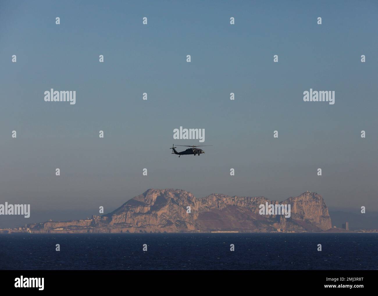 220825-N-EL850-1571 STRAIT OF GIBRALTAR (Aug. 25, 2022) A MH-60S ...