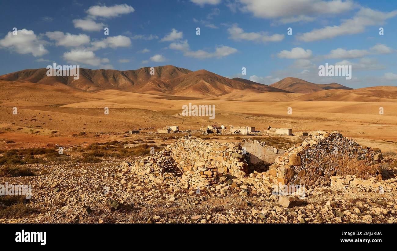 Island interior, barren landscape, reddish brown hills, ruins of ...