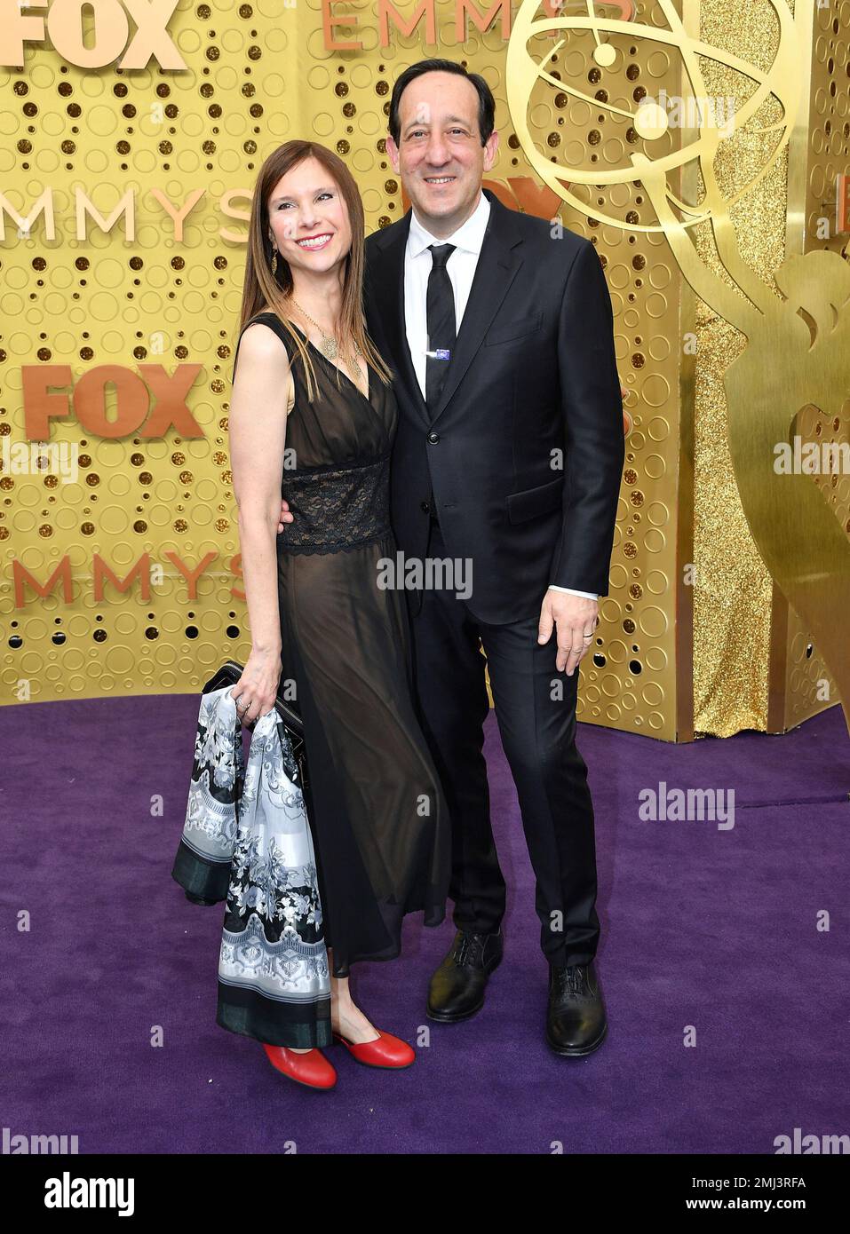 Jennifer Miner, left, and David Miner arrive at the 71st Primetime Emmy ...