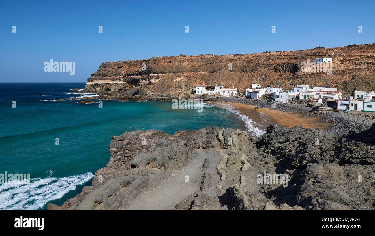 Puertito de los Molinos, whole beach, waves, surf, several small white ...