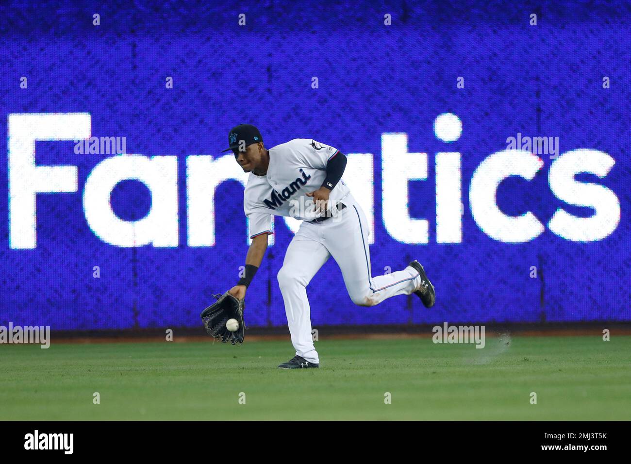 Miami Marlins center fielder Magneuris Sierra fields a ball hit by ...