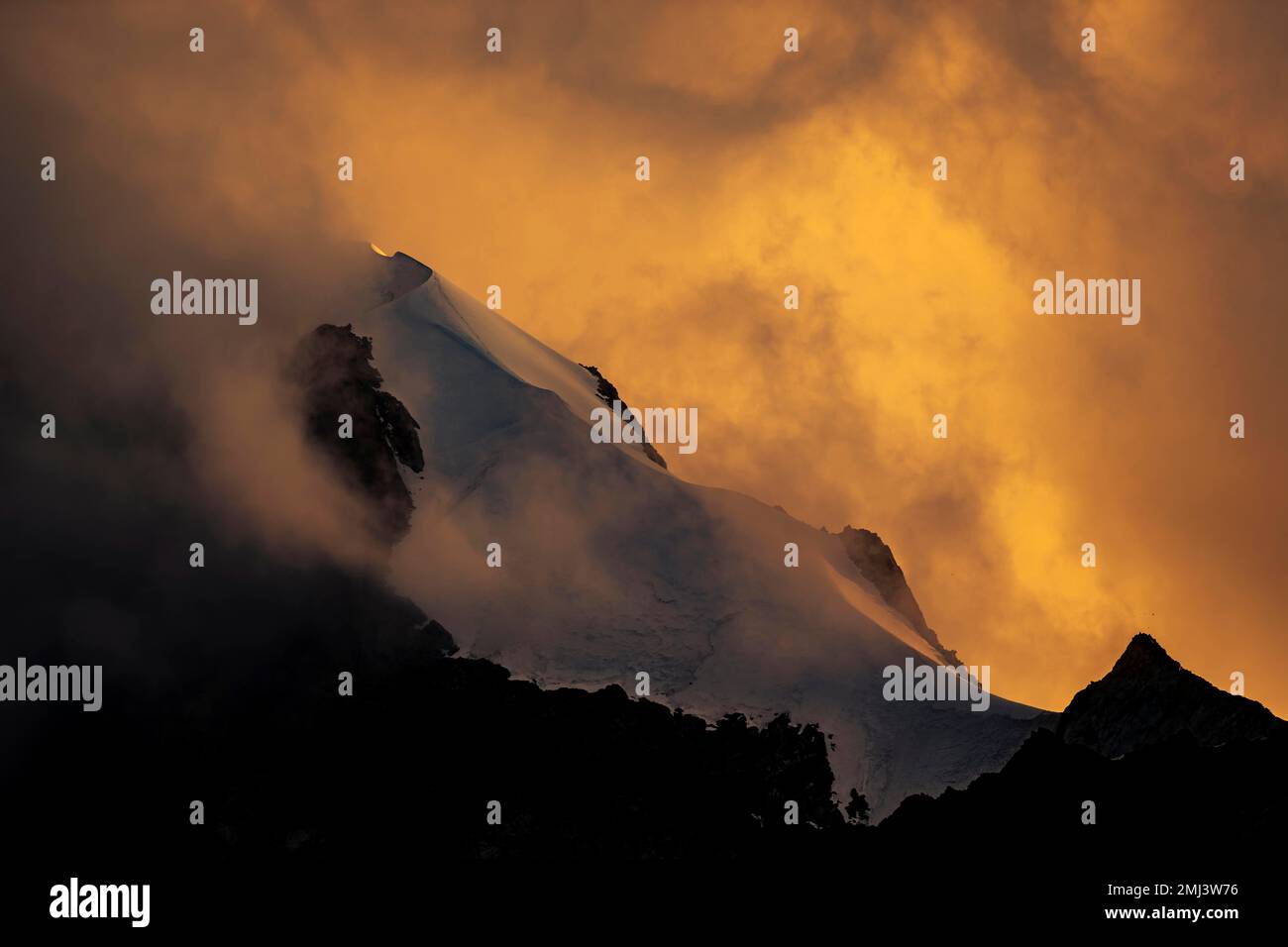 Detail of the Bianco Ridge in Bernina Group at sunset, St Moritz ...