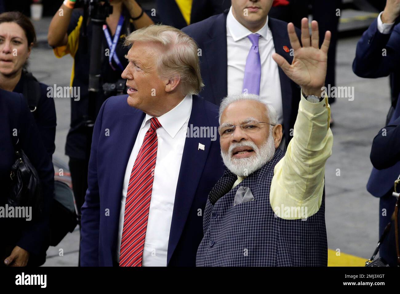 President Donald Trump and Indian Prime Minister Narendra Modi walk ...