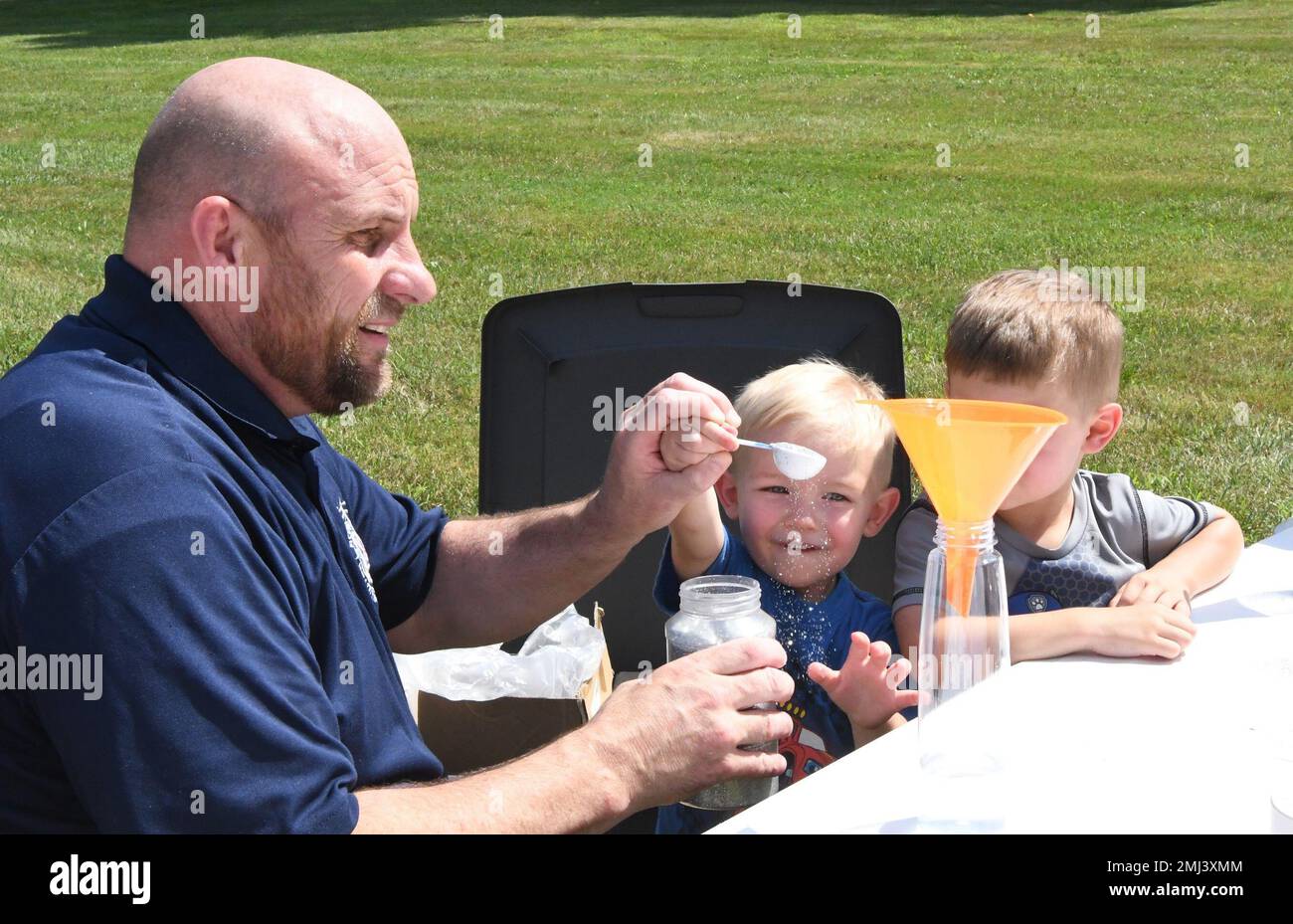 Dan Johnson, with the Fort Drum Readiness Relocation Program, helps ...